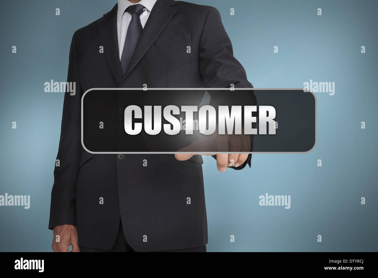 Businessman touching the word customer written on black tag Stock Photo ...