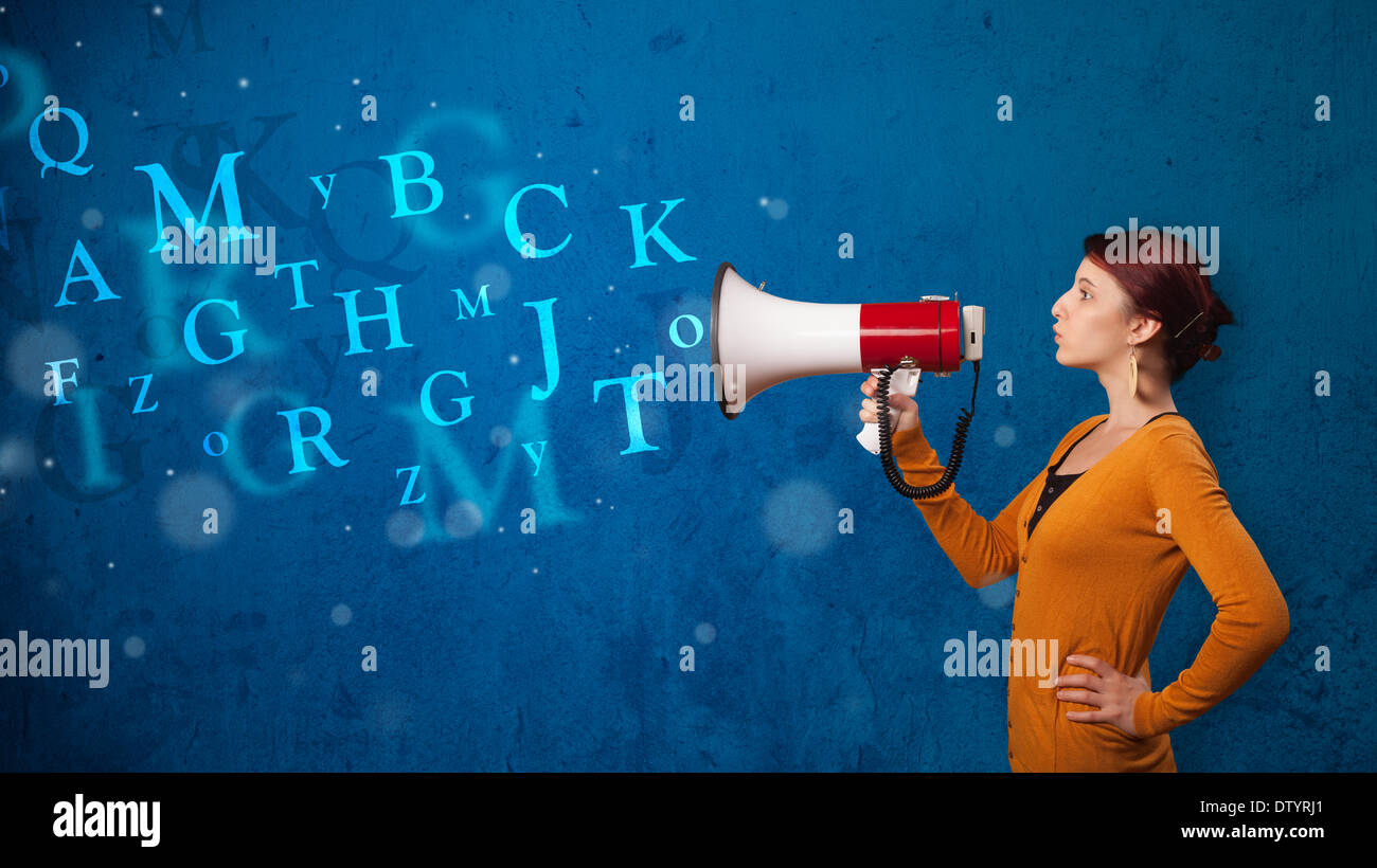 Young girl shouting into megaphone and text come out Stock Photo - Alamy