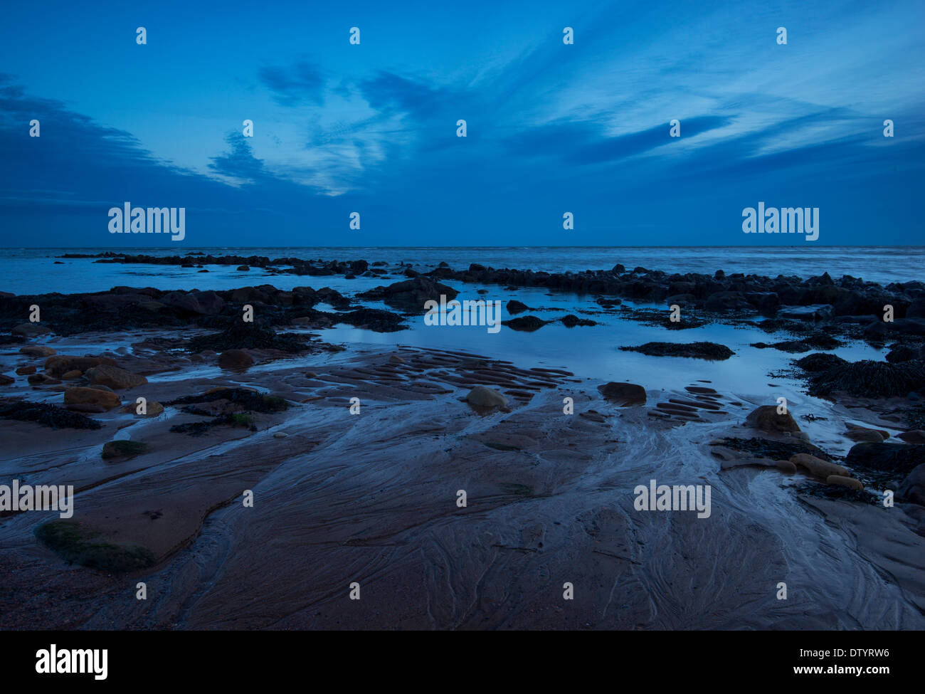 Sunrise at Saltwick Bay Whitby, North Yorkshire England UK Stock Photo ...