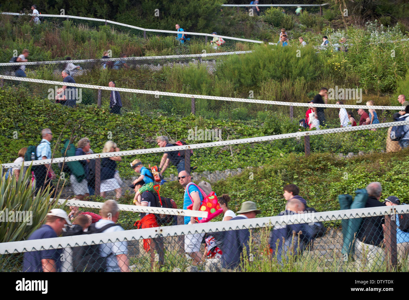 crowds of people walking up and down zig zag path along Bournemouth ...