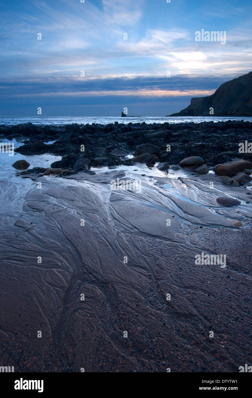 Sunrise at Saltwick Bay Whitby, North Yorkshire England UK Stock Photo ...