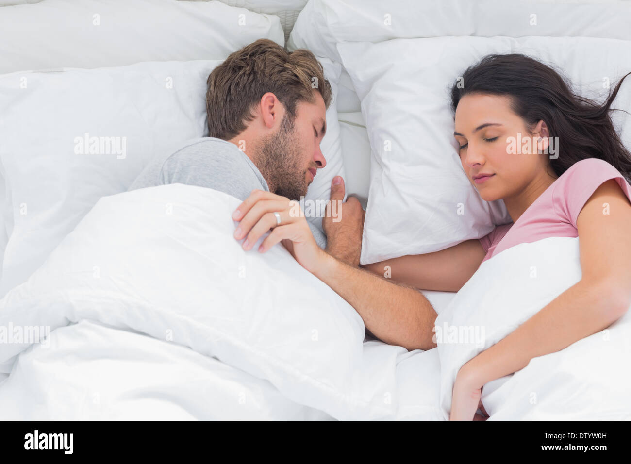 Calm couple sleeping in bed hi-res stock photography and images - Alamy