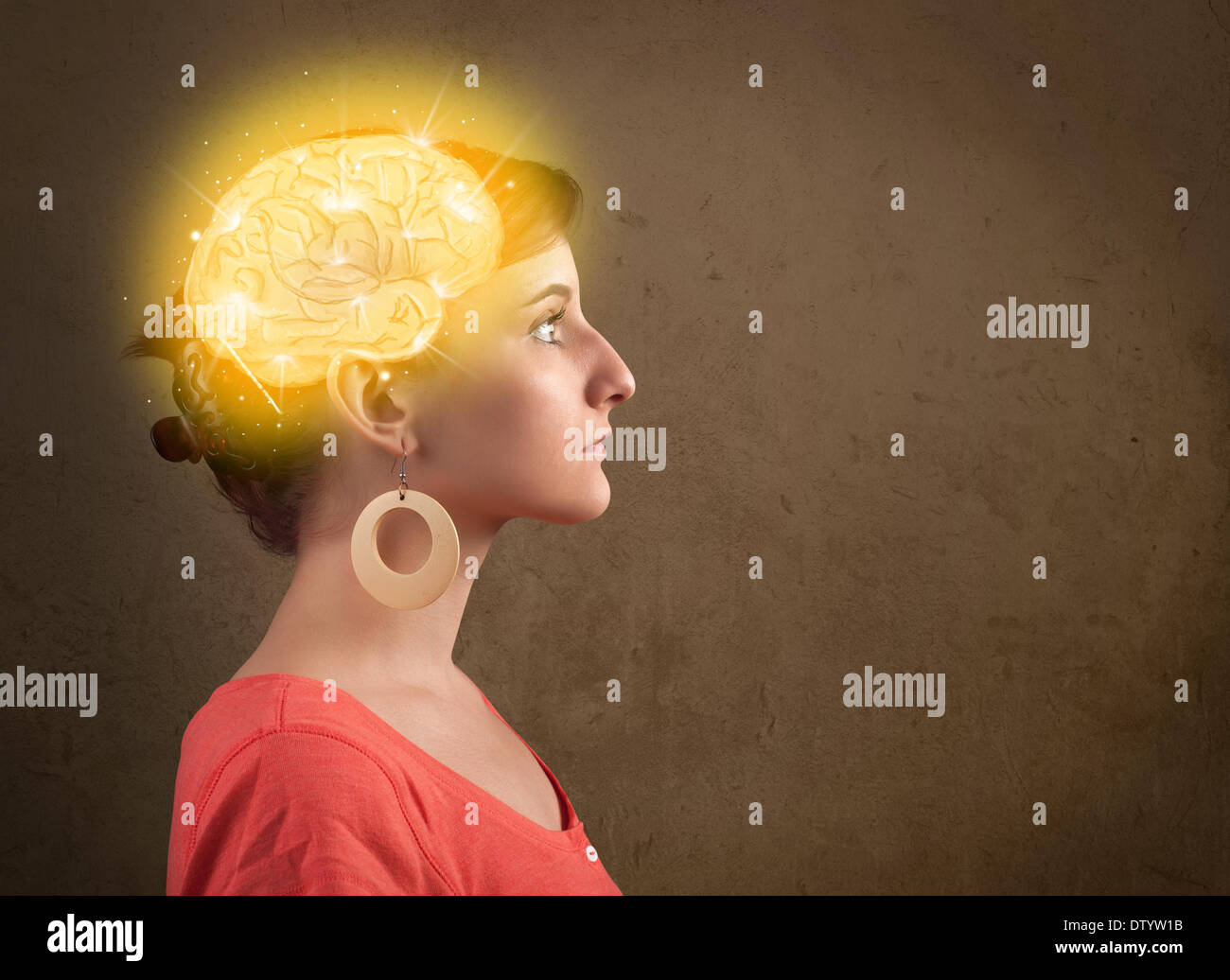 Young girl thinking with glowing brain illustration Stock Photo - Alamy