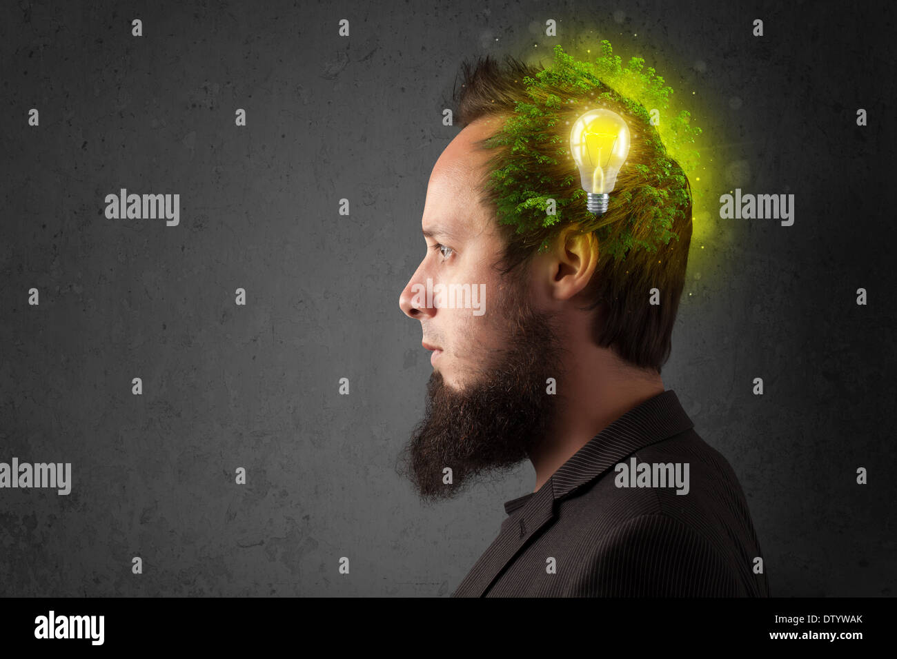 Young mind thinking of green eco energy with lightbulb Stock Photo - Alamy