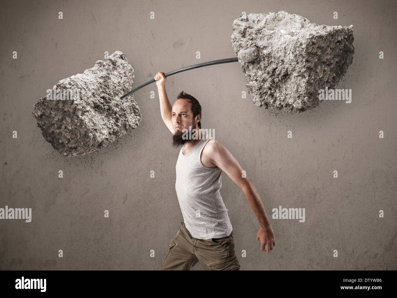 skinny guy lifting large rock stone weights Stock Photo - Alamy