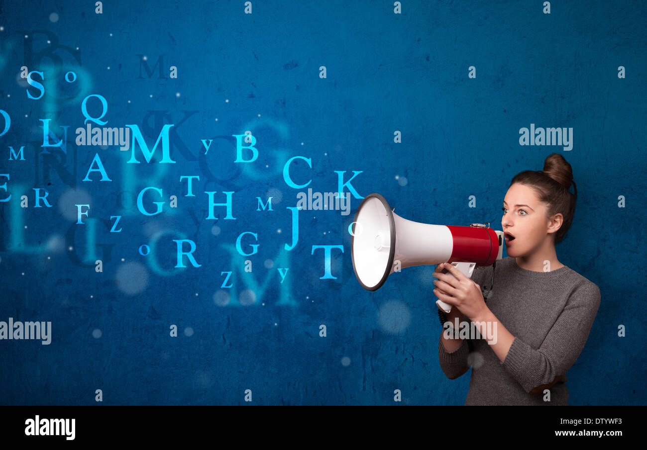Young girl shouting into megaphone and text come out Stock Photo - Alamy