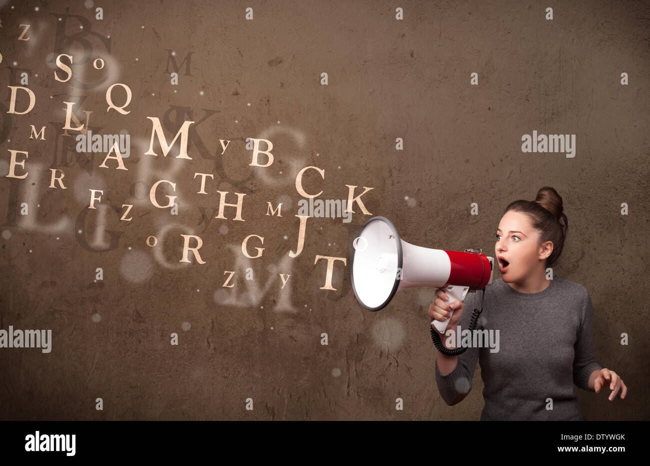 Young girl shouting into megaphone and text come out Stock Photo - Alamy