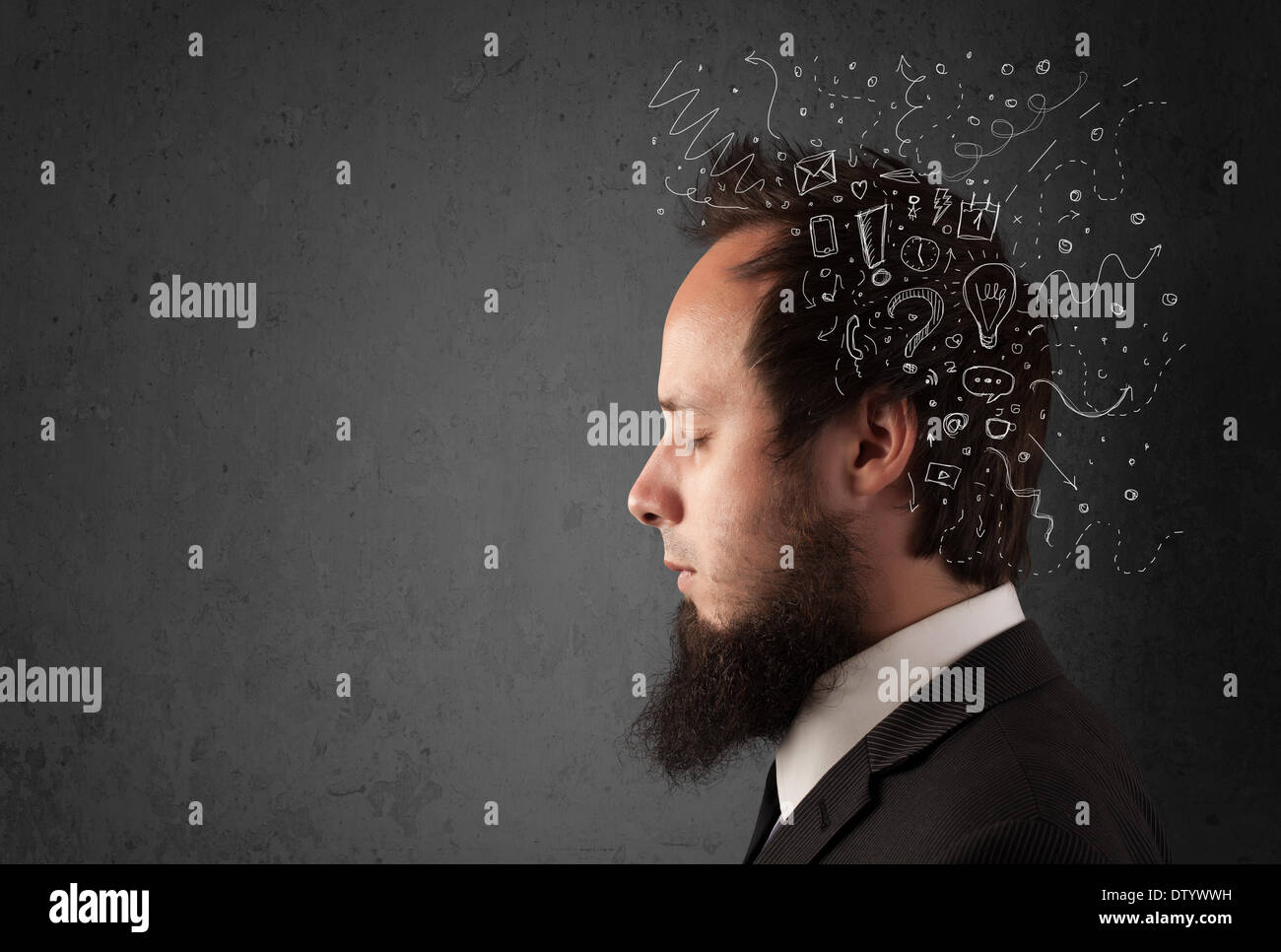 Young man thinking with abstract lines and symbols Stock Photo - Alamy