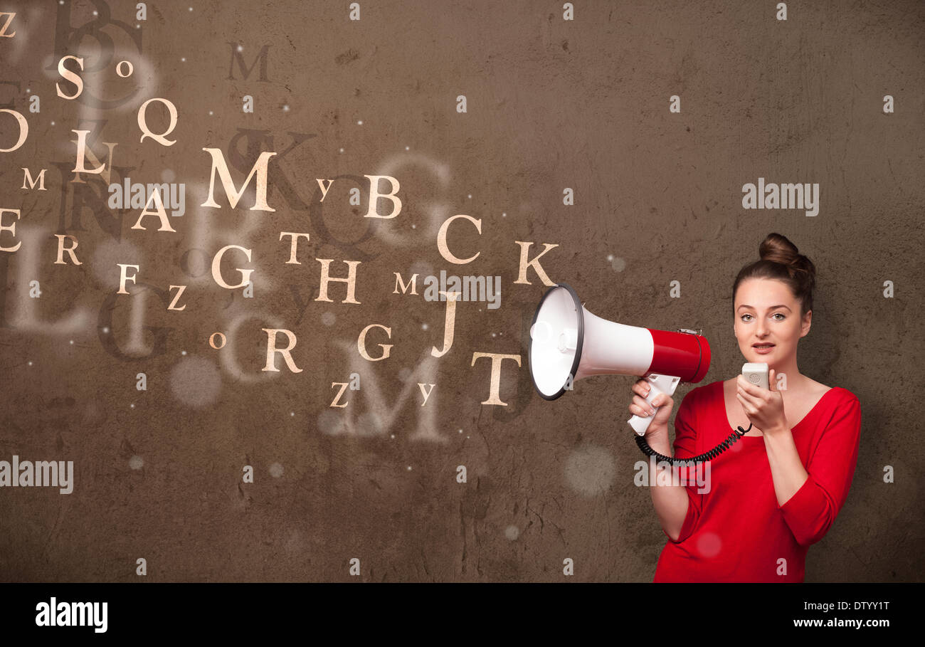 Young girl shouting into megaphone and text come out Stock Photo - Alamy