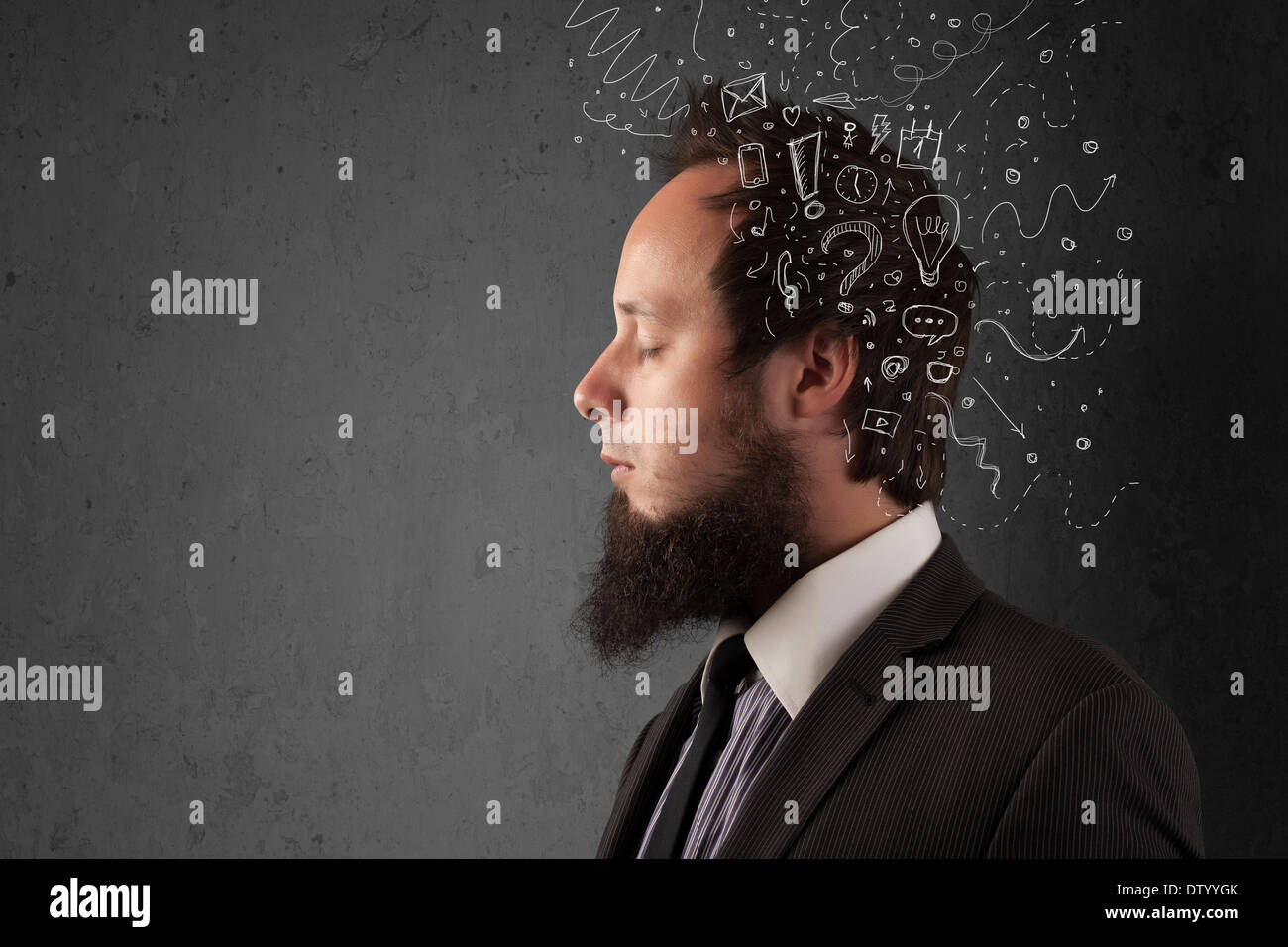 Young man thinking with abstract lines and symbols Stock Photo - Alamy