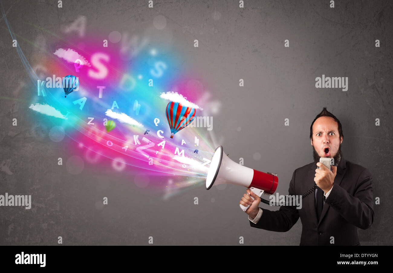 Man shouting into megaphone and abstract text and balloons come out ...