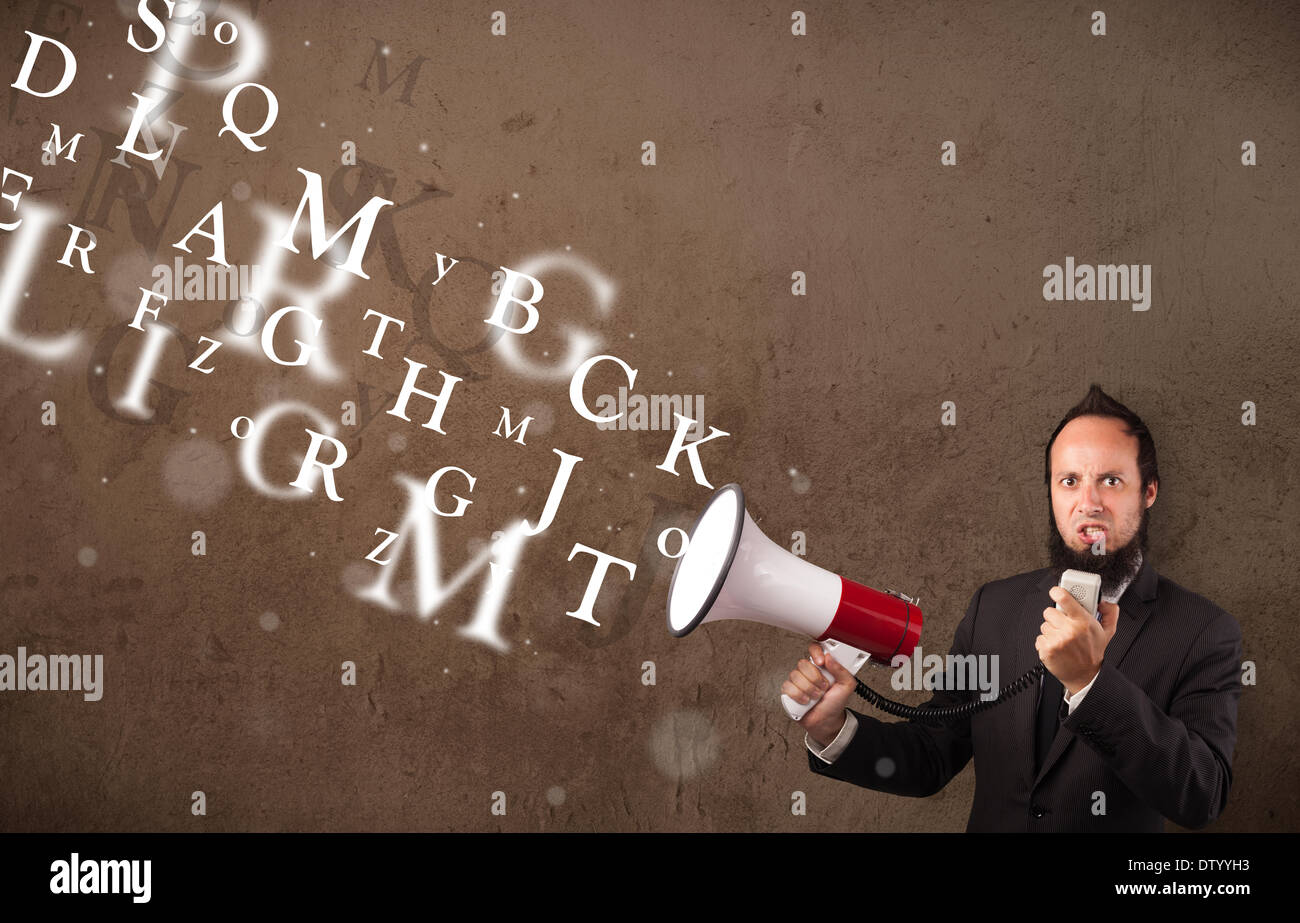 Man in shirt shouting into megaphone and text come out Stock Photo - Alamy