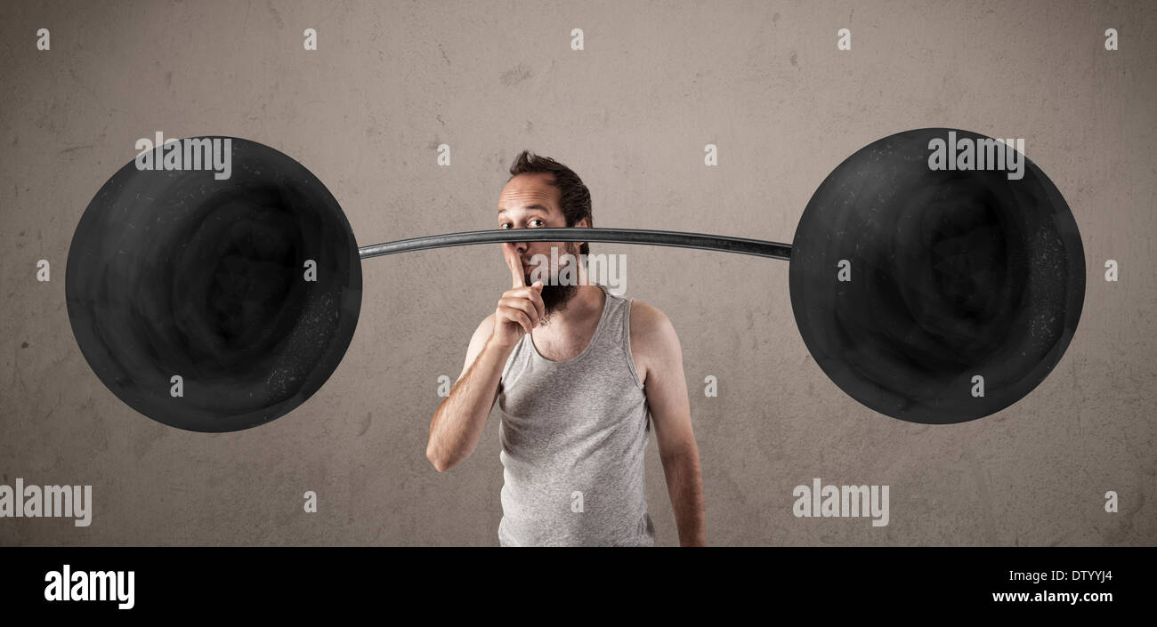 Funny skinny guy lifting weights Stock Photo - Alamy