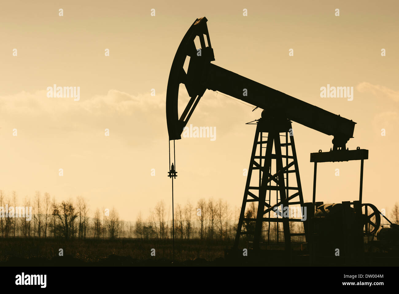 oil rig on the plains selective focus on nearest Stock Photo - Alamy