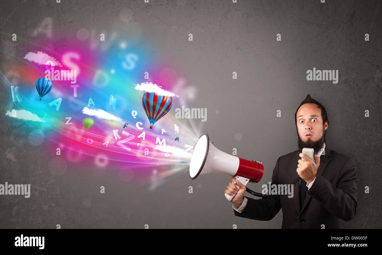 Man shouting into megaphone and abstract text and balloons come out ...