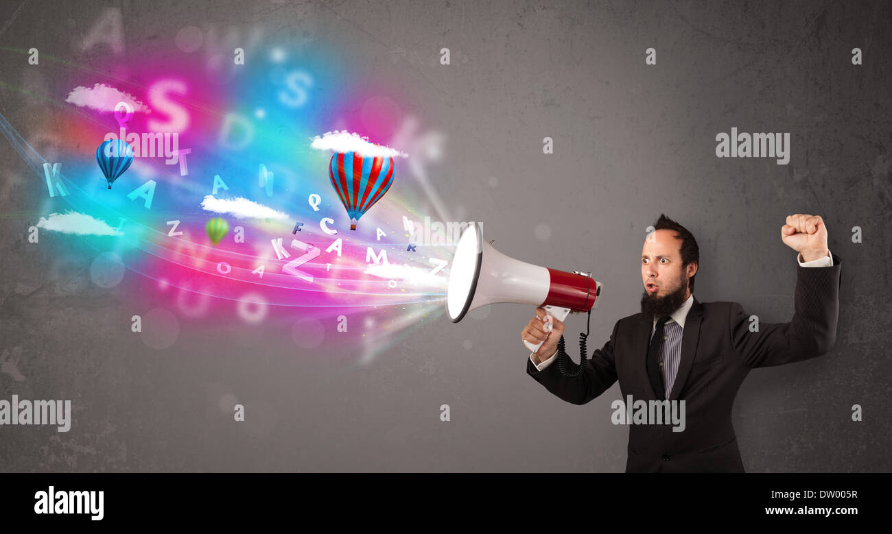 Man shouting into megaphone and abstract text and balloons come out ...