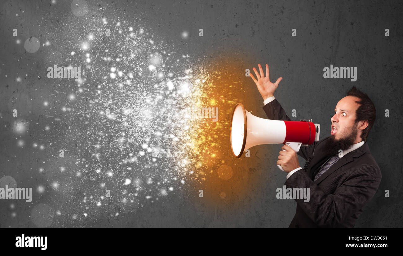 Guy shouting into megaphone and glowing energy particles explode Stock ...