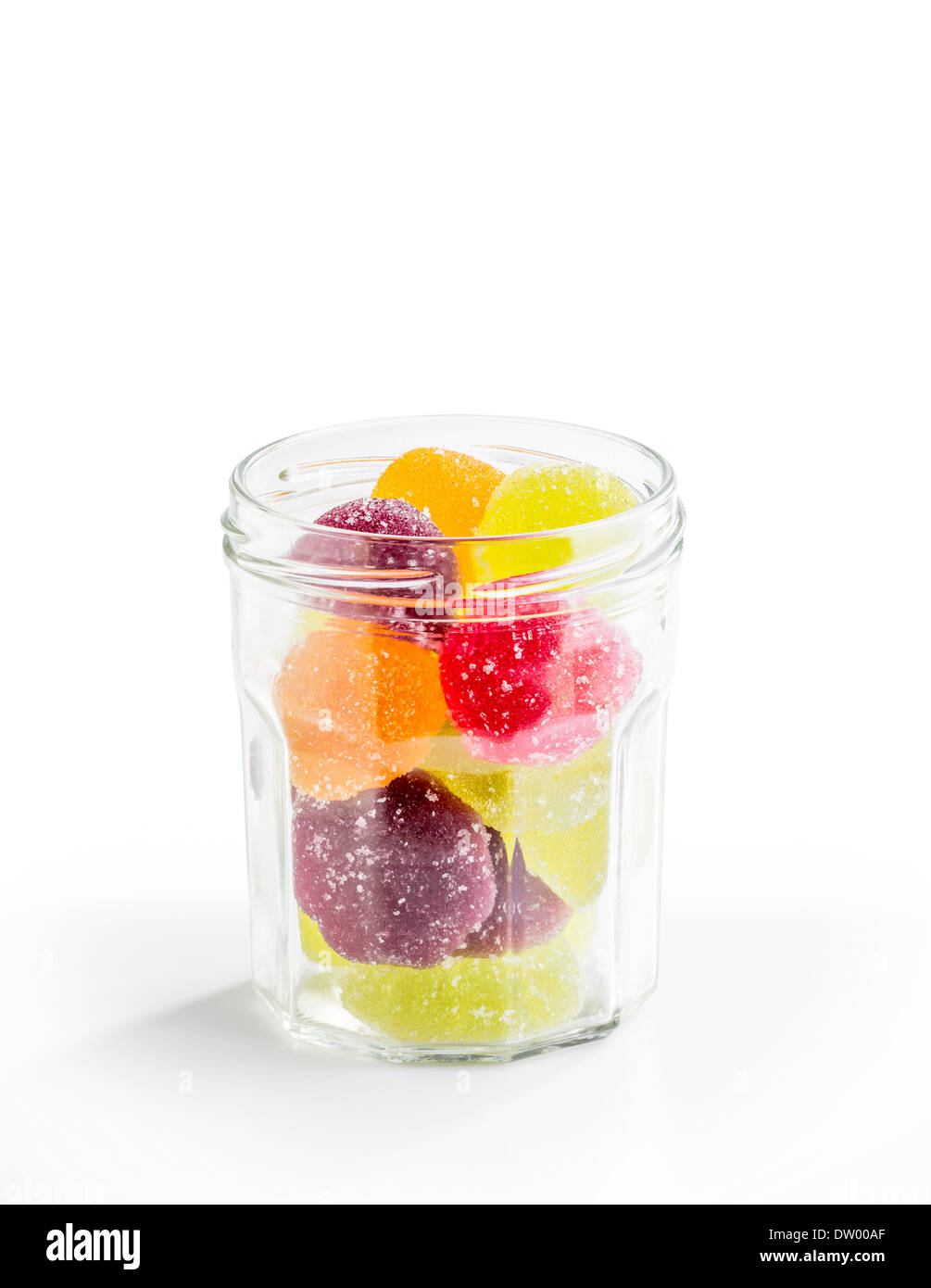 Colorful fruit jelly in open glass jar, on white background Stock Photo ...