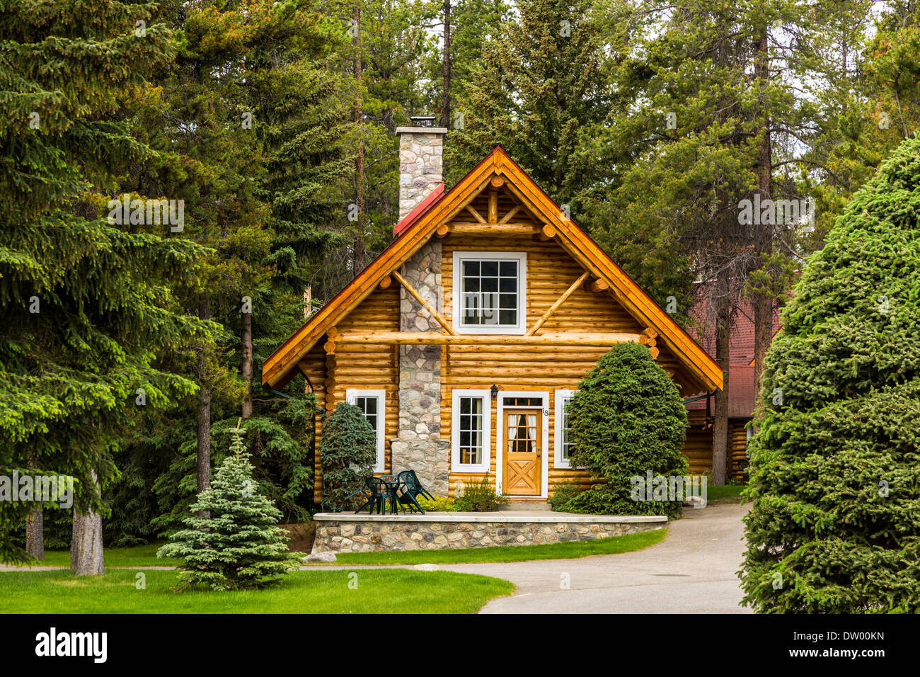 A cottage in the woods at the Alpine Village Resort in Jasper, Alberta ...