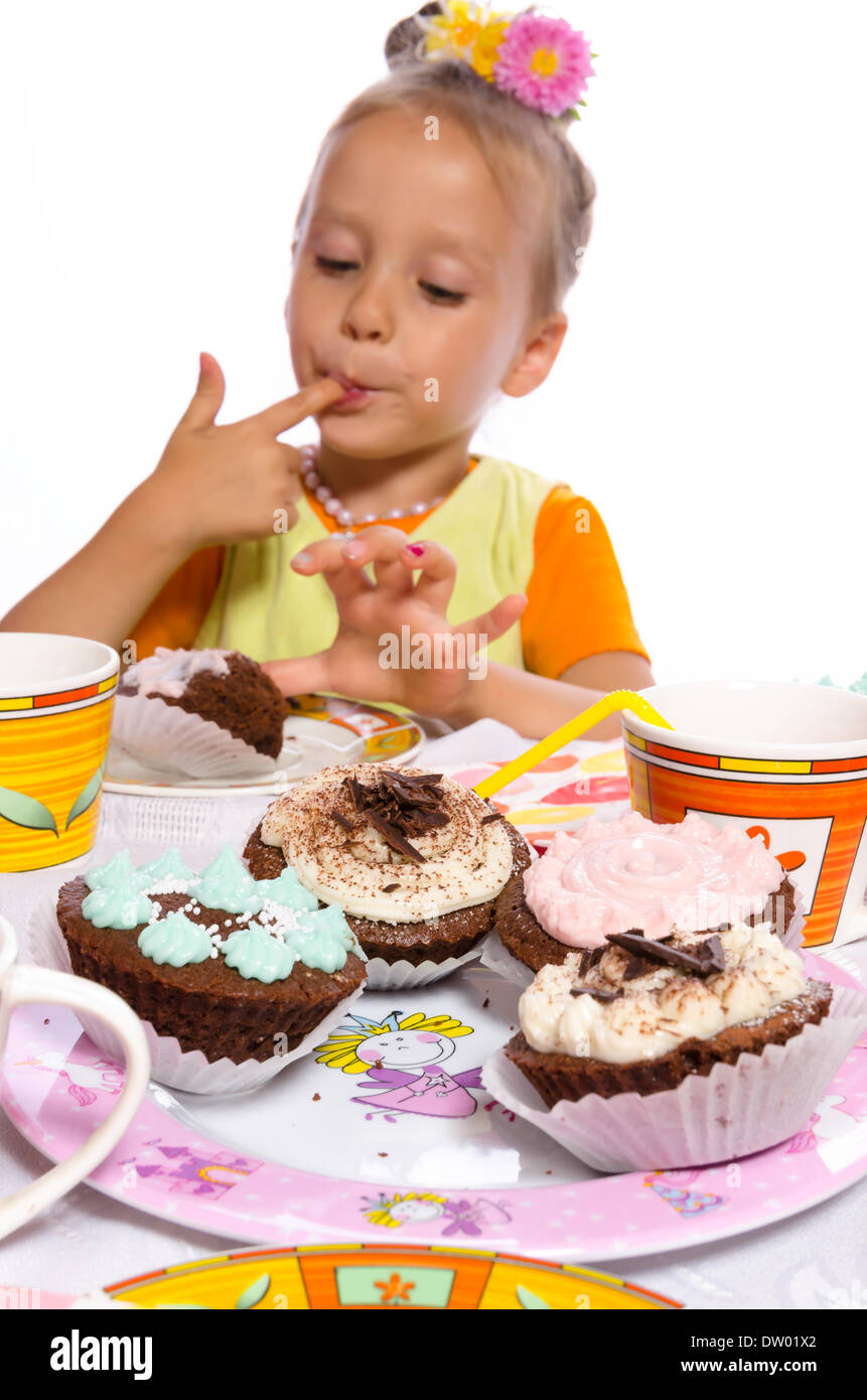 small girls and muffin Stock Photo - Alamy