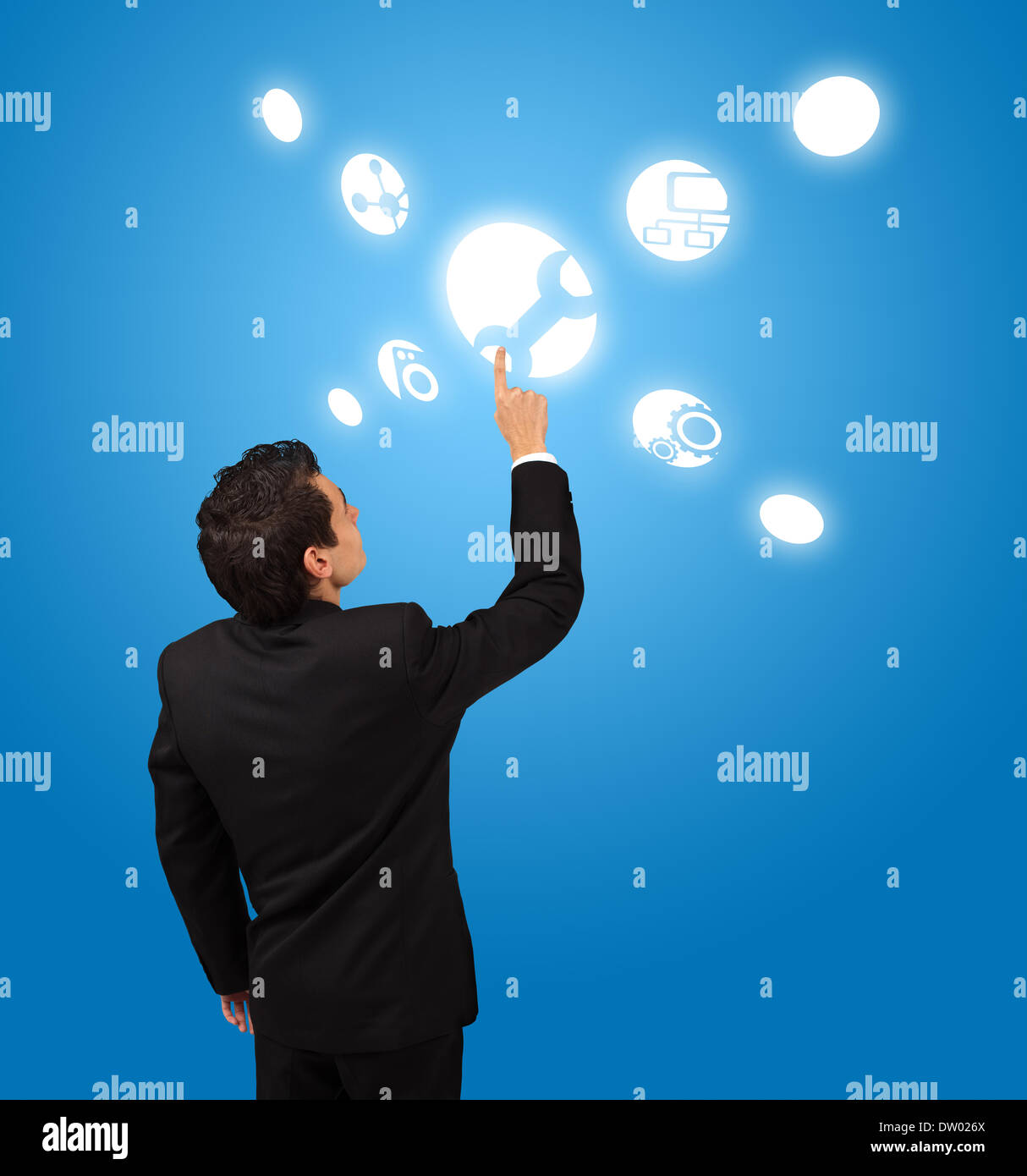 business man pressing touchscreen button Stock Photo - Alamy