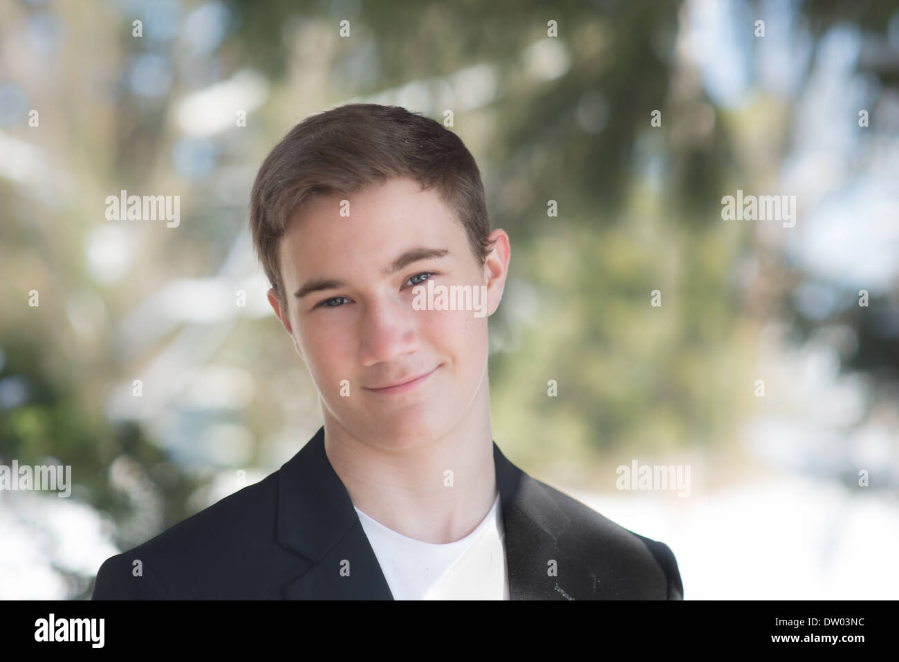 Teenage boy in an outdoor setting Stock Photo - Alamy