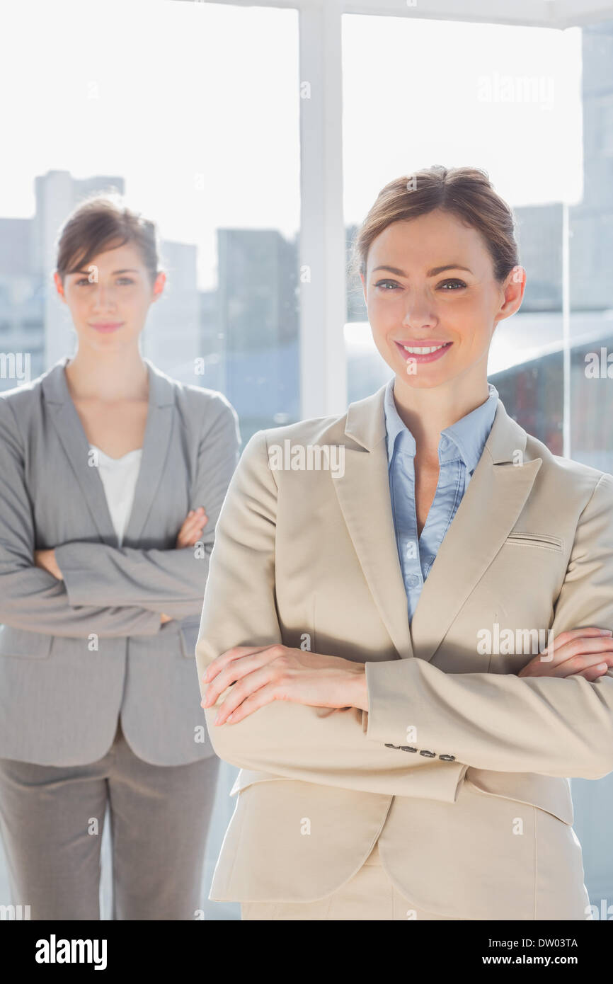Two happy smart businesswomen hi-res stock photography and images - Alamy