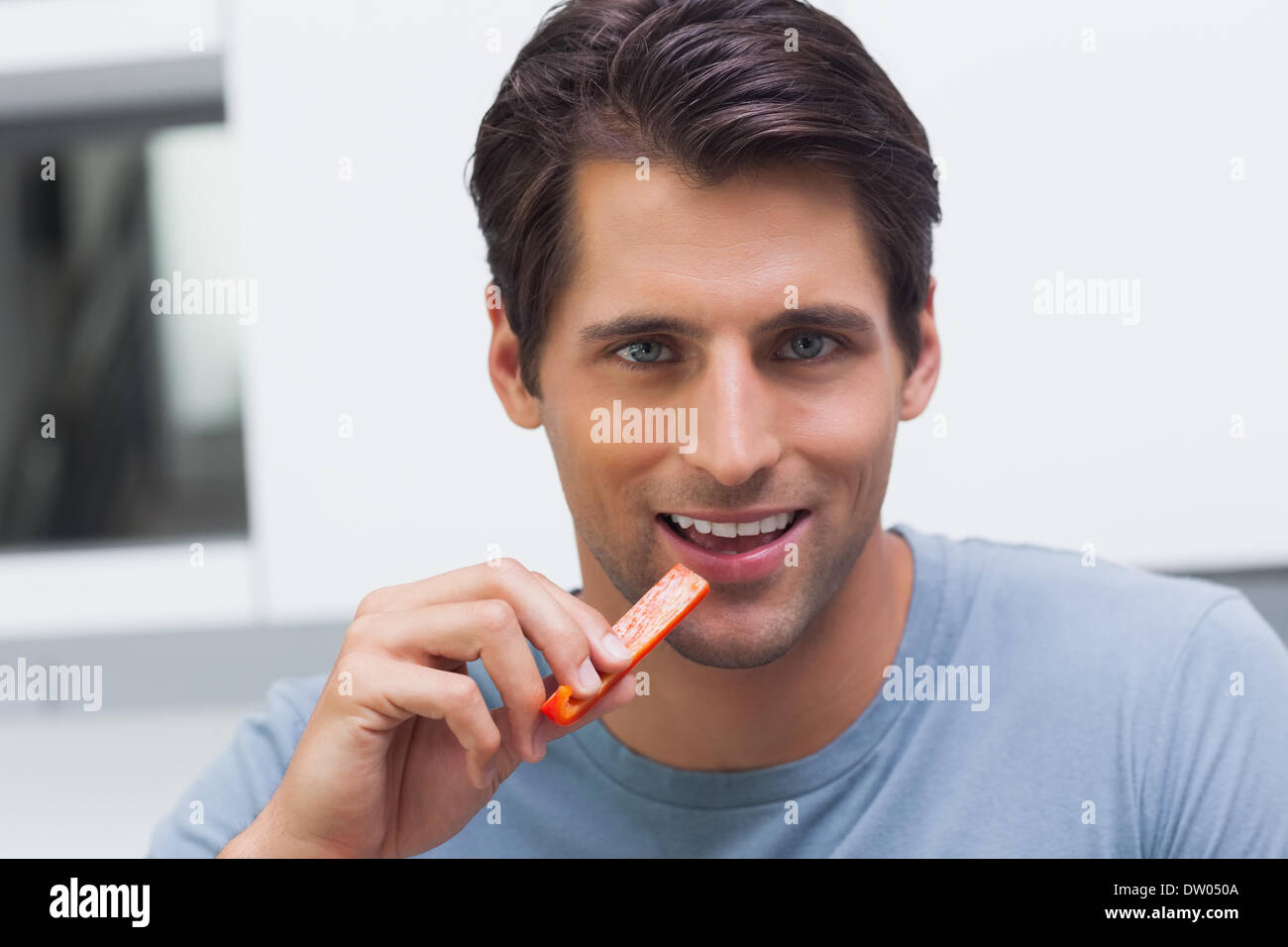 Man eating vegetable handsome hi-res stock photography and images - Alamy