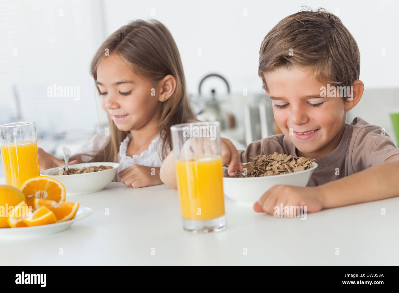 Siblings eating hi-res stock photography and images - Alamy