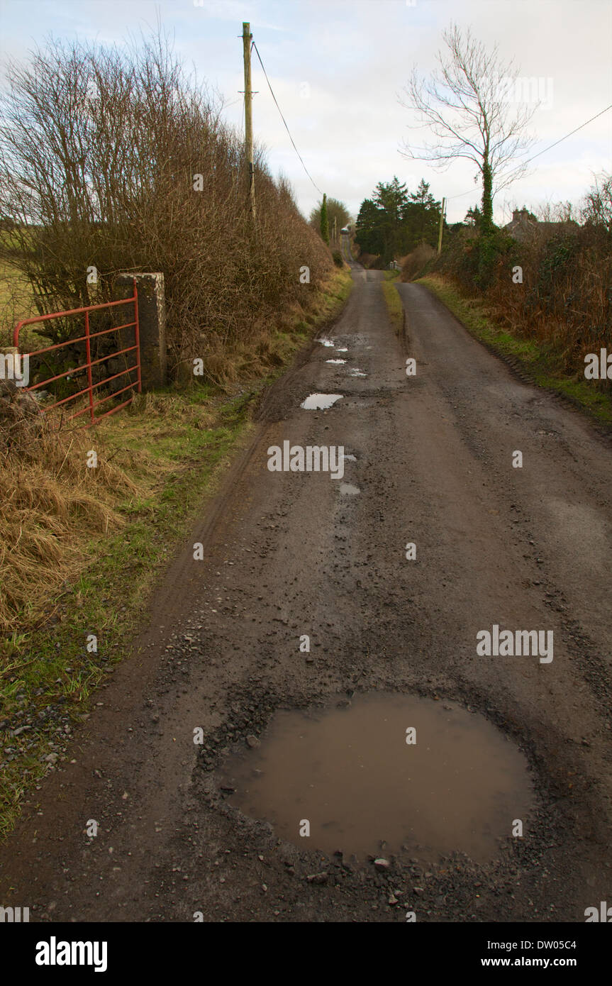 Potholes on a country road in rural County Mayo, Ireland Stock Photo ...