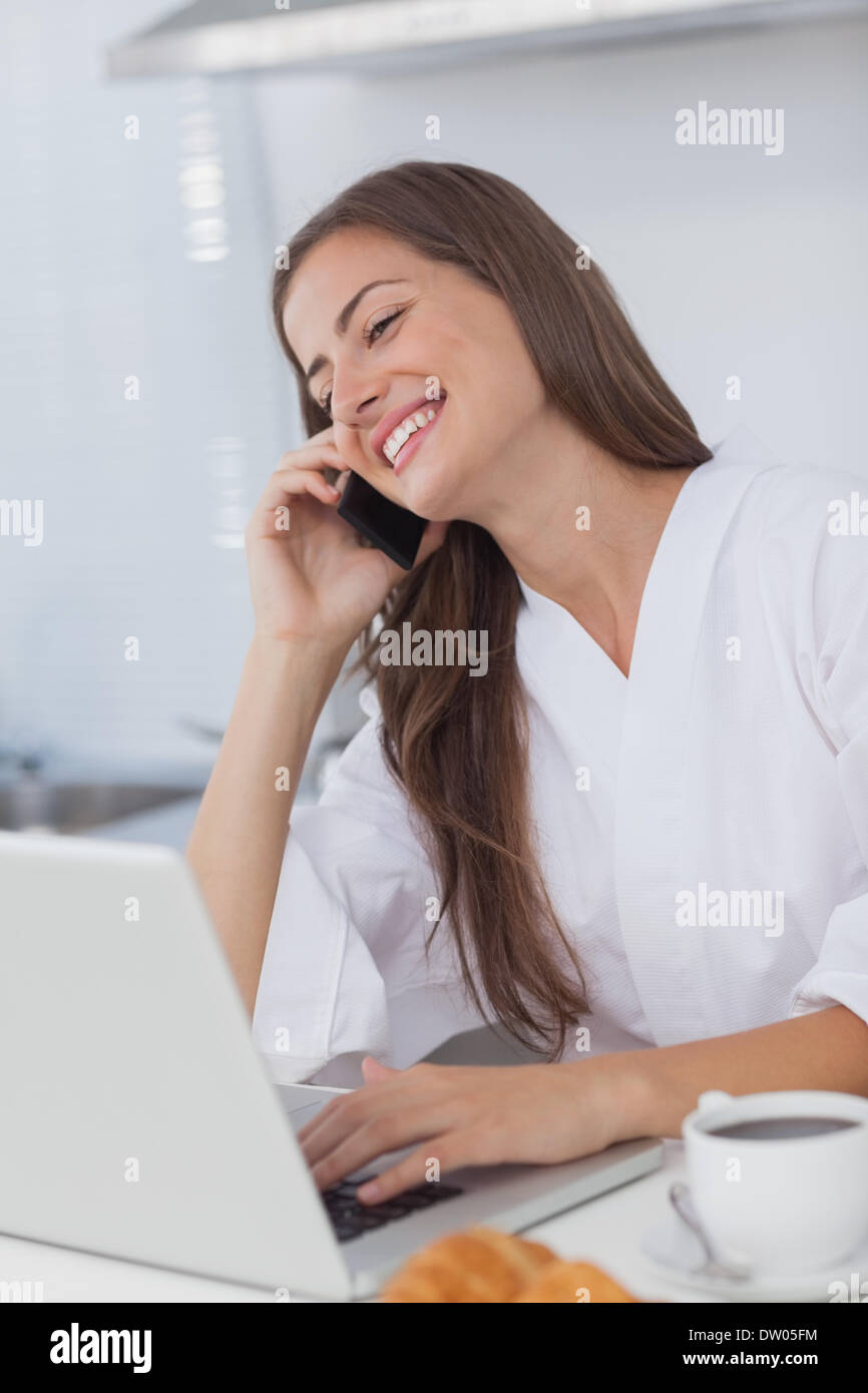 Cheerful brunette woman phoning hi-res stock photography and images - Alamy
