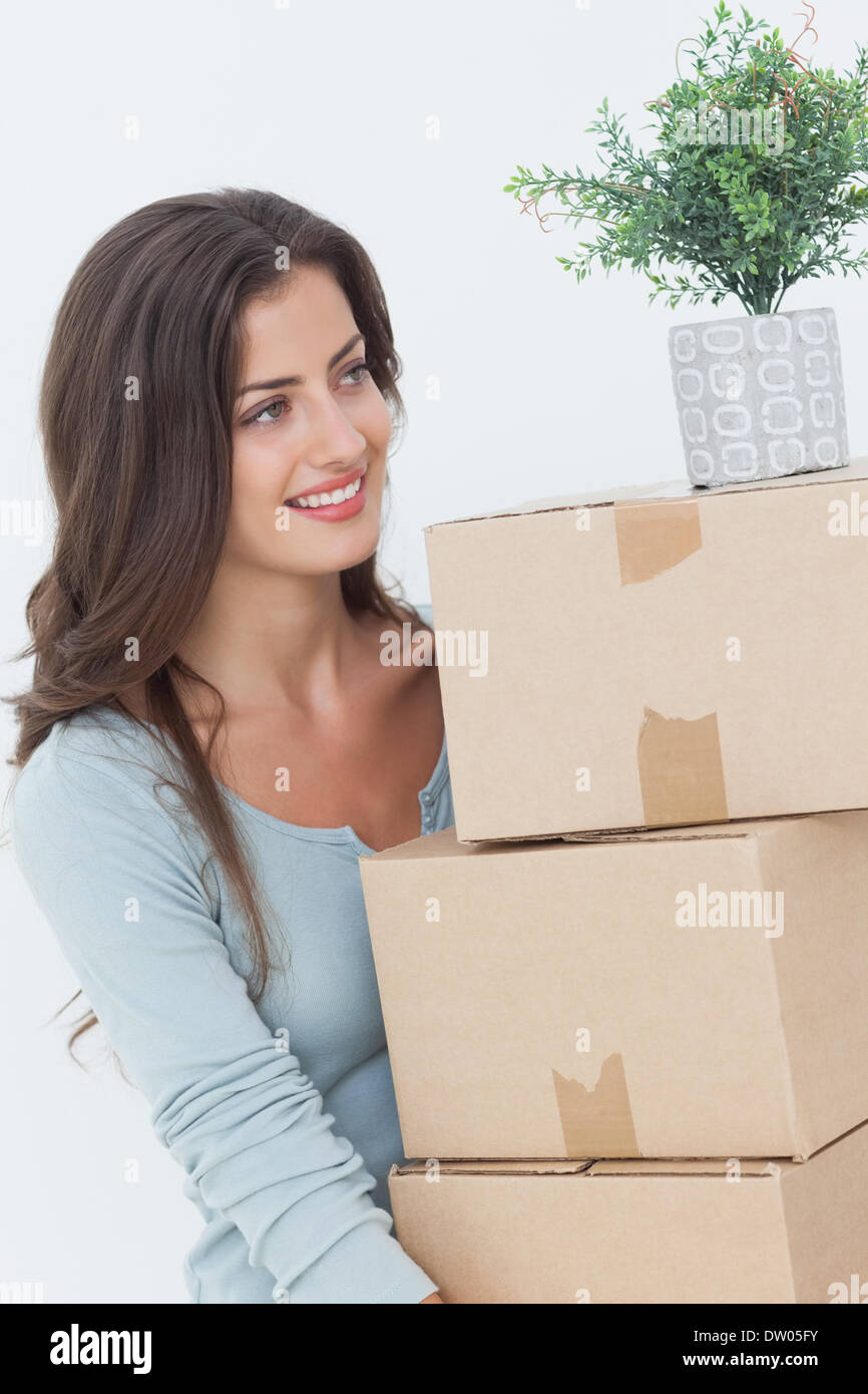 Pretty woman carrying boxes hi-res stock photography and images - Alamy