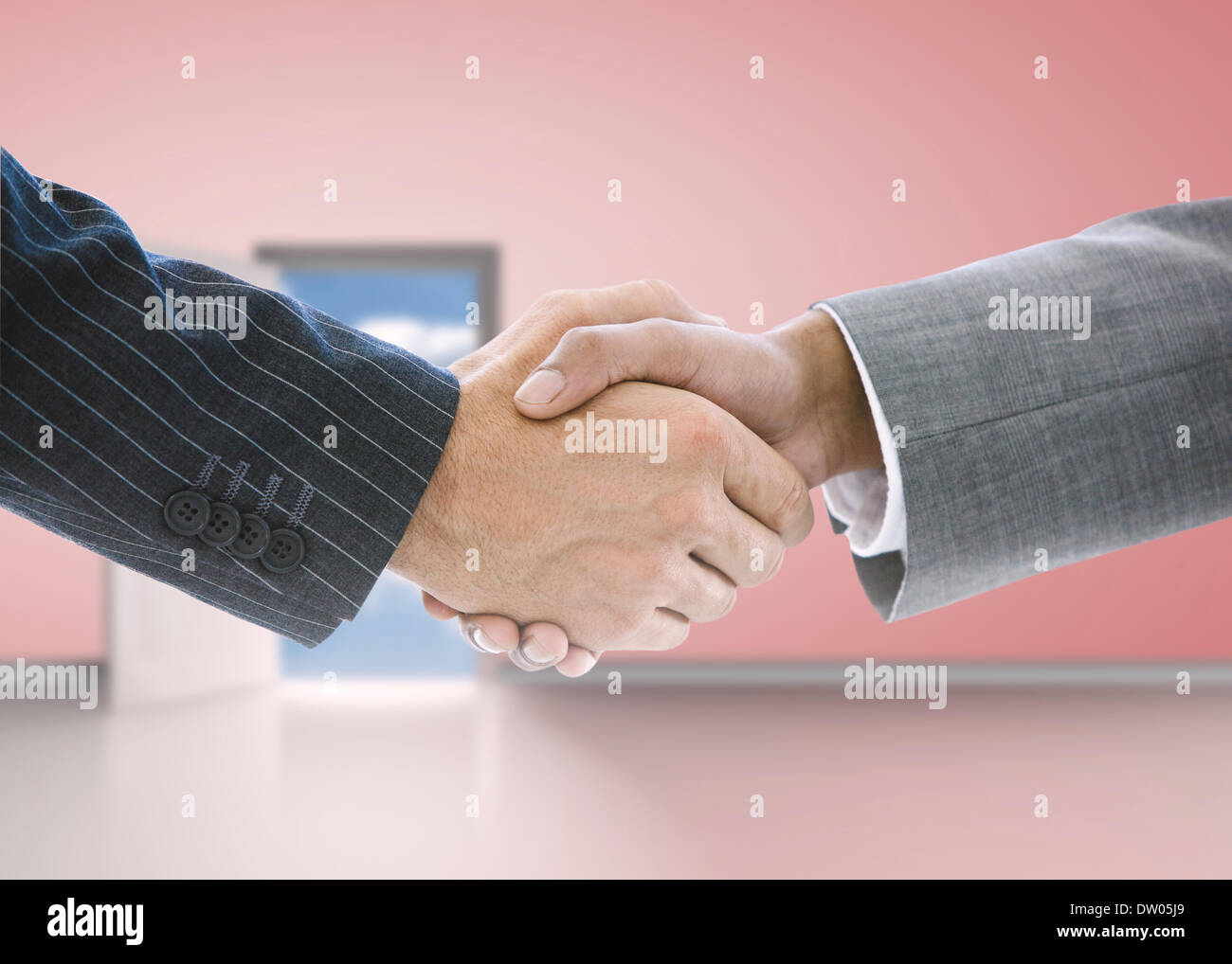 Businessmen shaking hands Stock Photo - Alamy