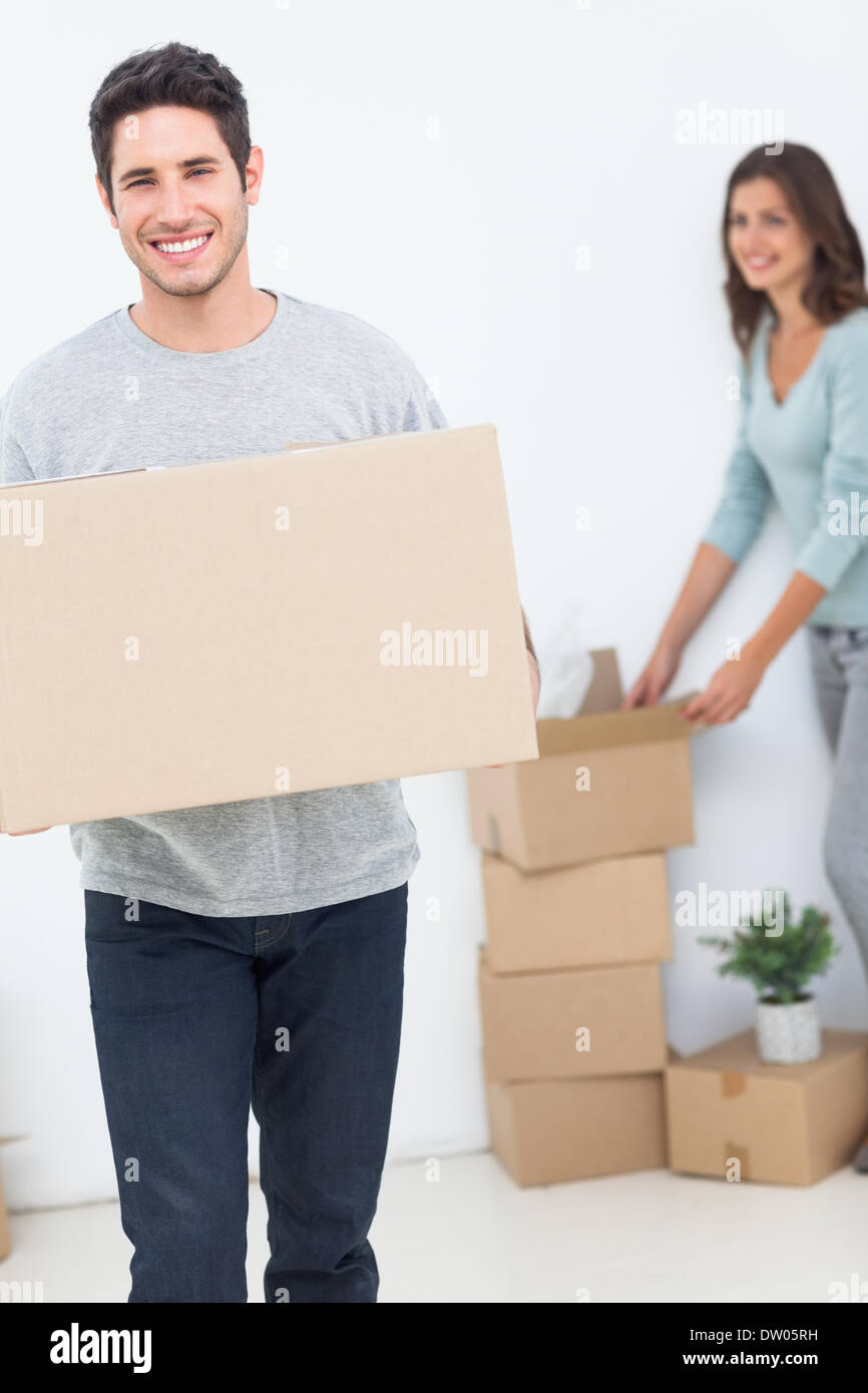 Man and his wife moving in a new house Stock Photo - Alamy