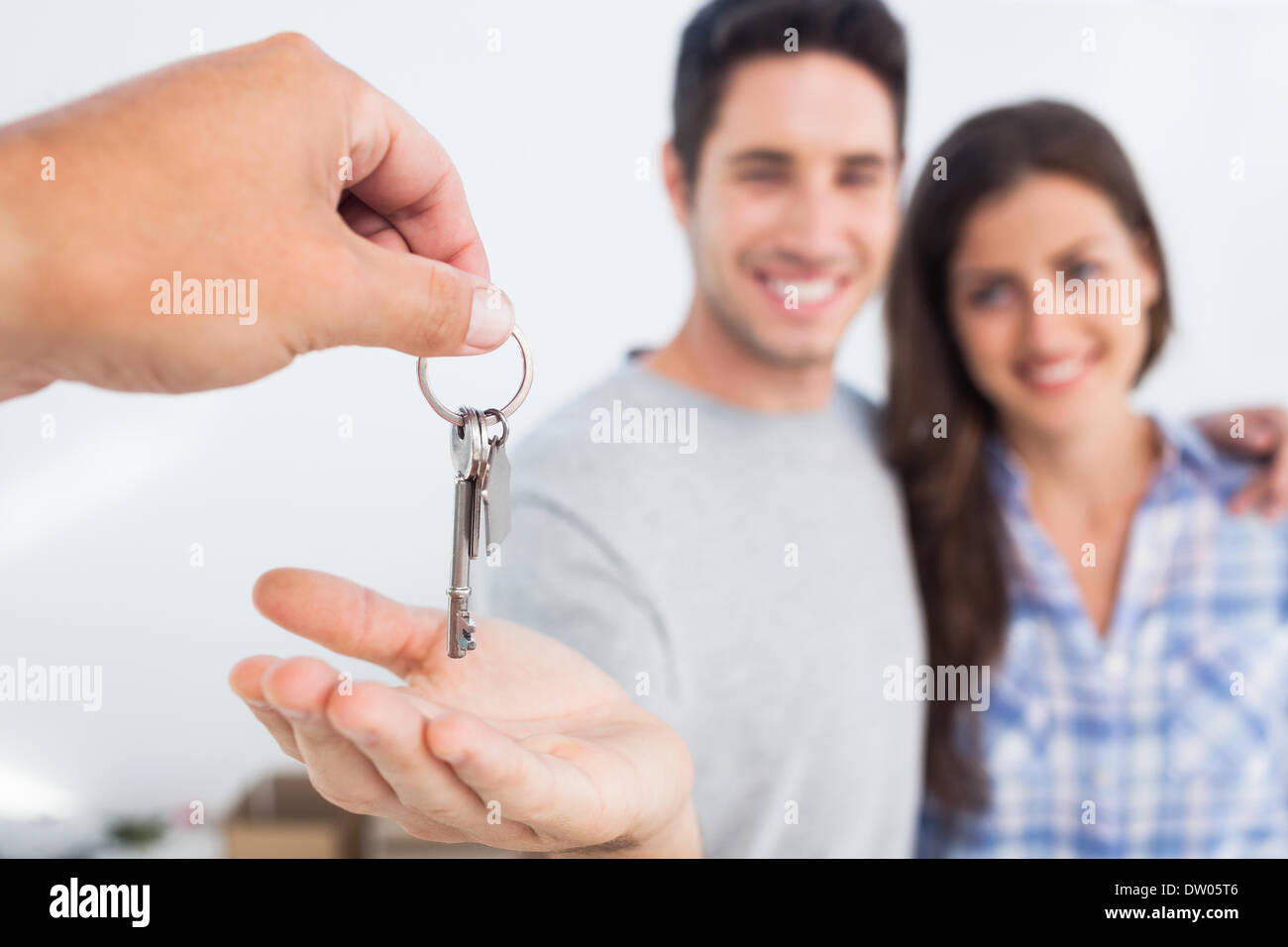 Man handing house key hi-res stock photography and images - Alamy