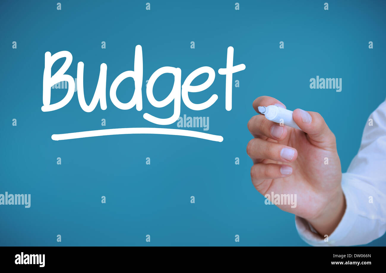 Hand writing budget Stock Photo - Alamy