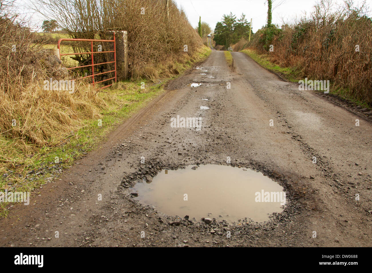 Potholes on a country road in rural County Mayo, Ireland Stock Photo ...