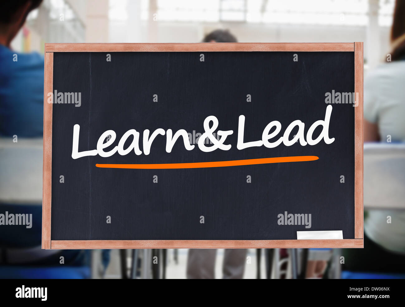 Learn and lead written on blackboard Stock Photo - Alamy