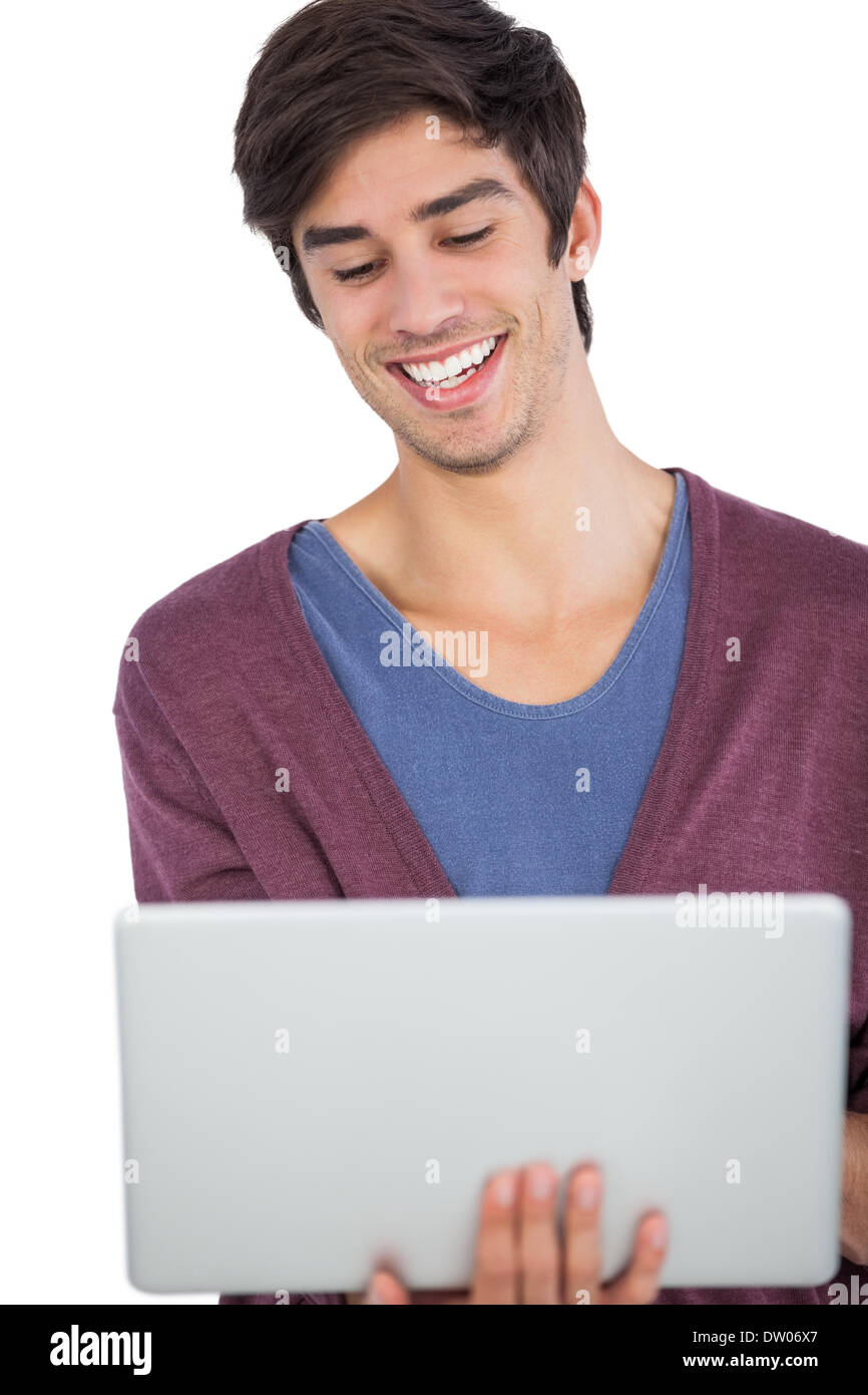 Laughing black man using laptop hi-res stock photography and images - Alamy