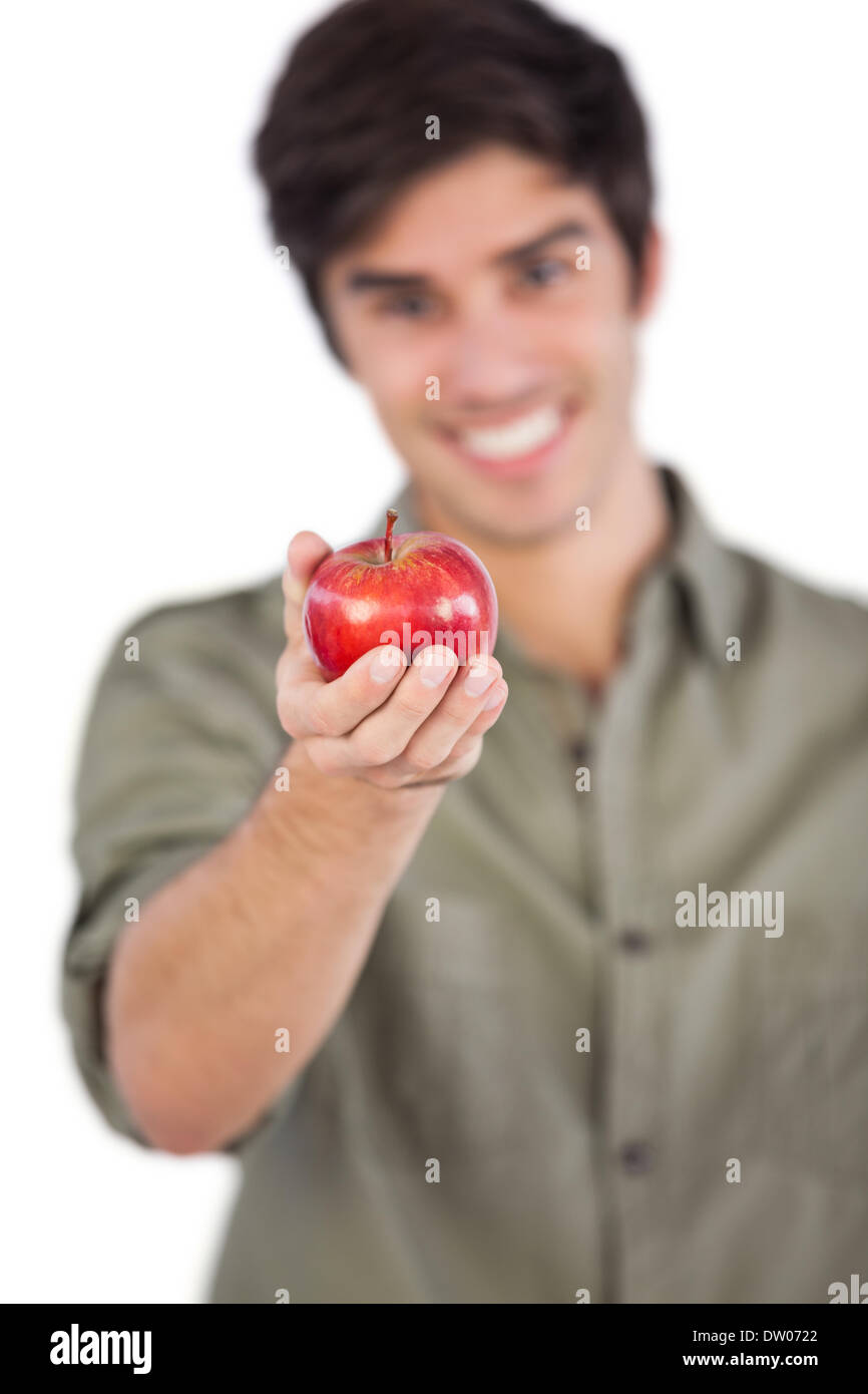 Man holding apple on his hand Stock Photo - Alamy