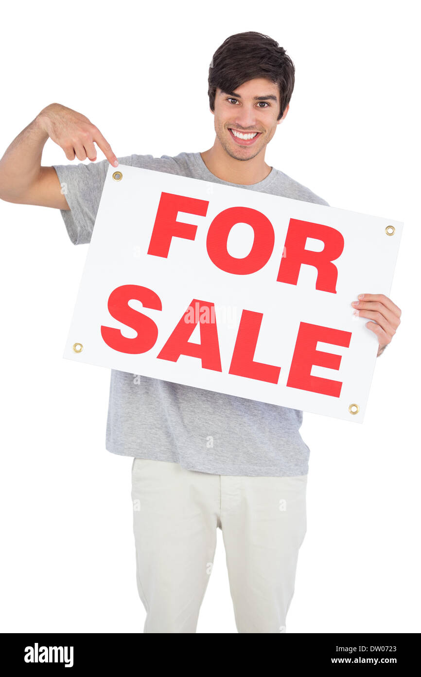 Attractive hispanic man pointing Cut Out Stock Images & Pictures - Alamy