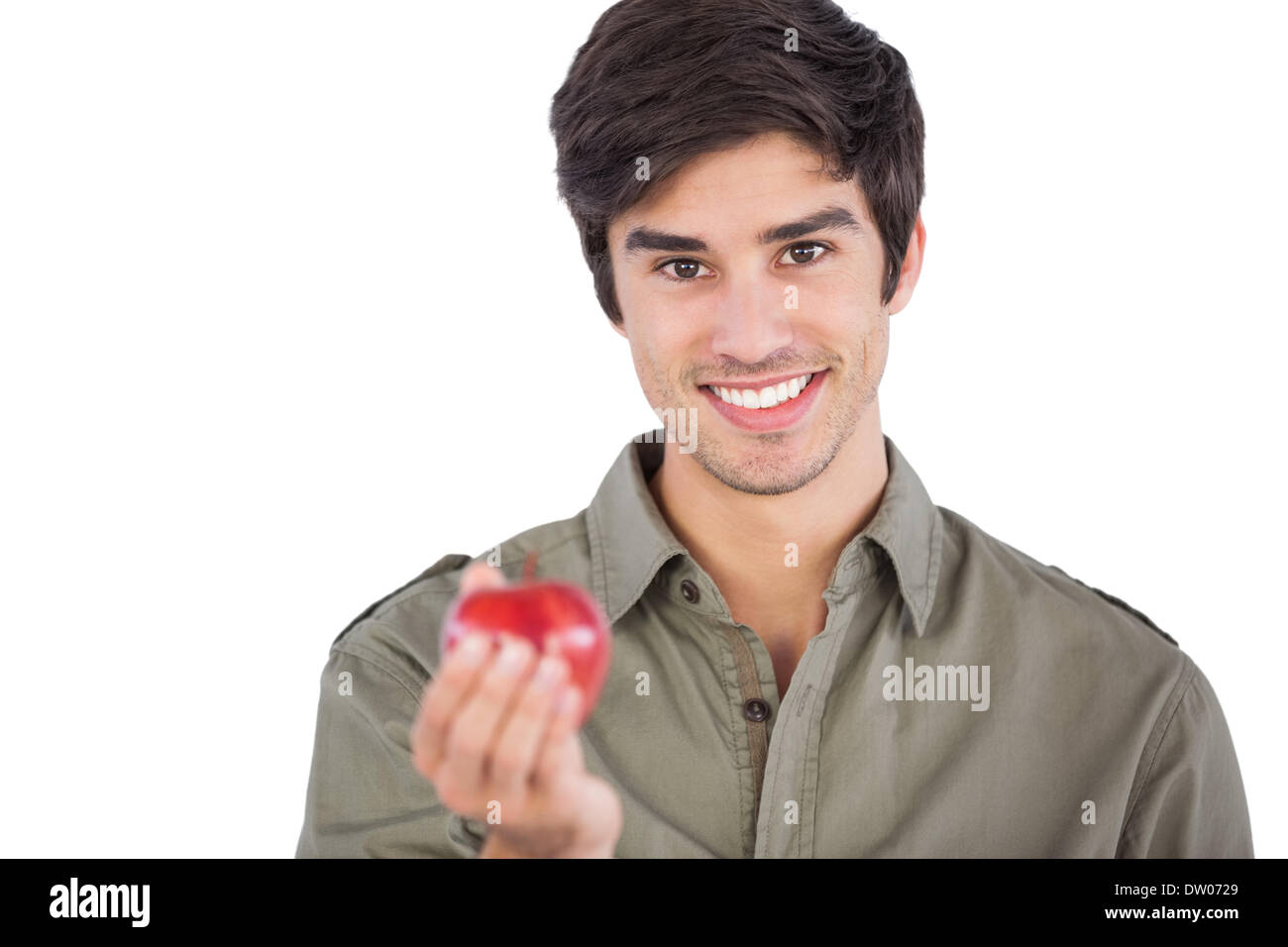 Man holding an apple Stock Photo - Alamy
