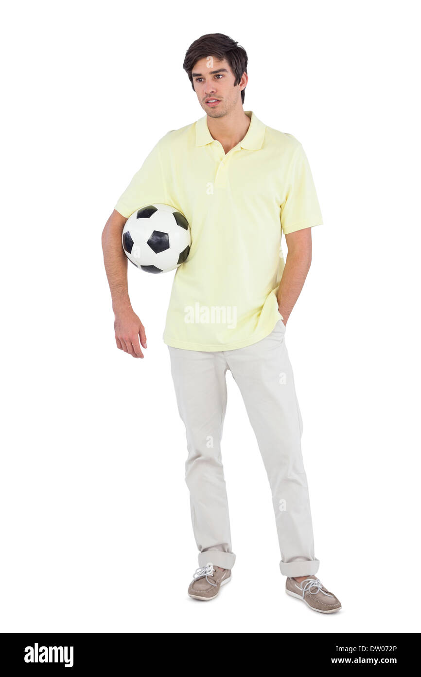 Holding soccer ball handsome Cut Out Stock Images & Pictures - Alamy
