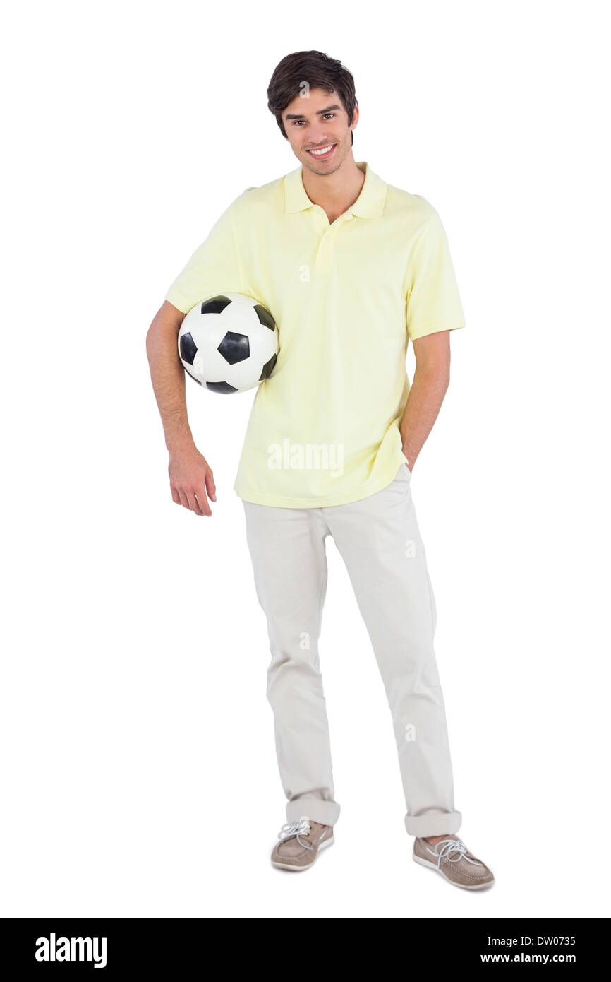 Holding soccer ball handsome Cut Out Stock Images & Pictures - Alamy