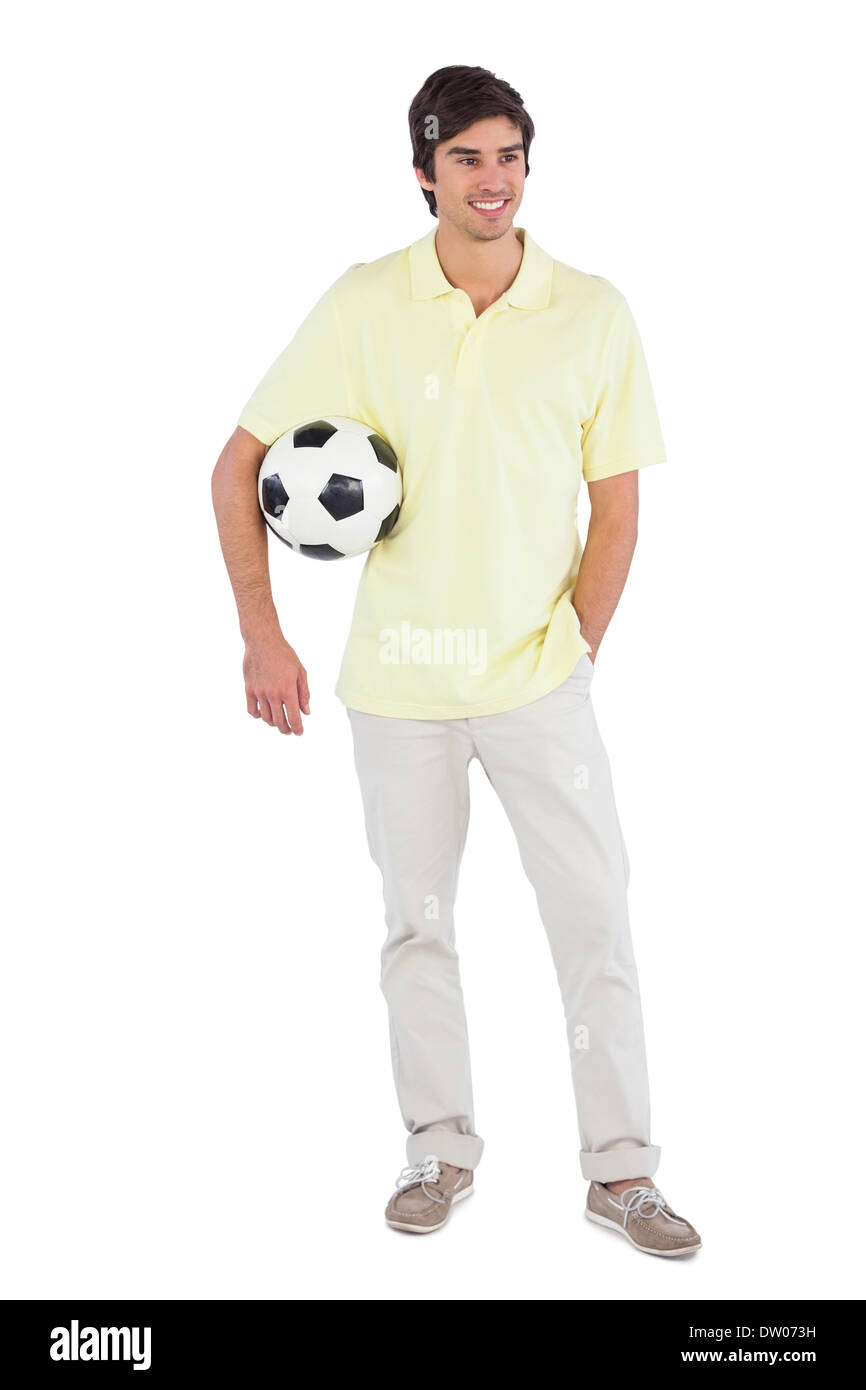 Holding soccer ball handsome Cut Out Stock Images & Pictures - Alamy