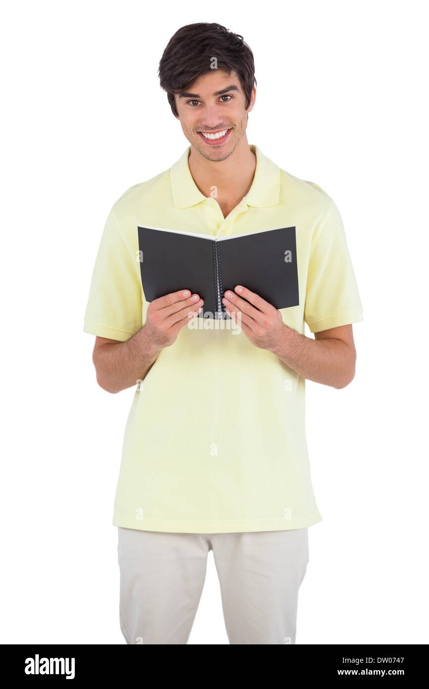 Student holding notebook Stock Photo - Alamy