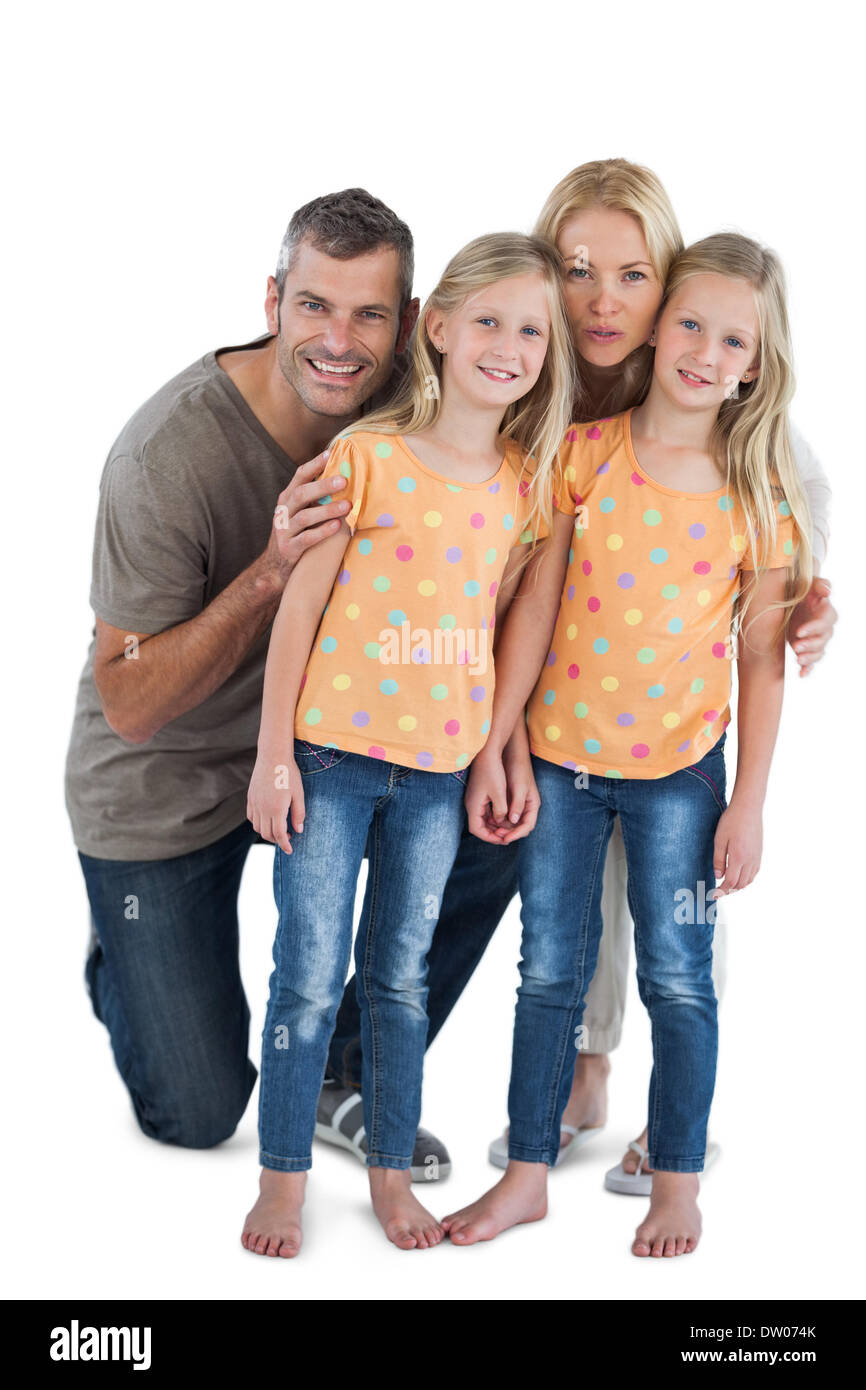 Happy family posing for the camera Stock Photo - Alamy