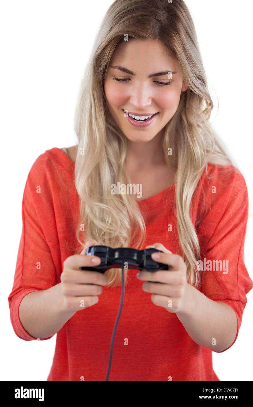 Woman playing video games standing hi-res stock photography and images ...