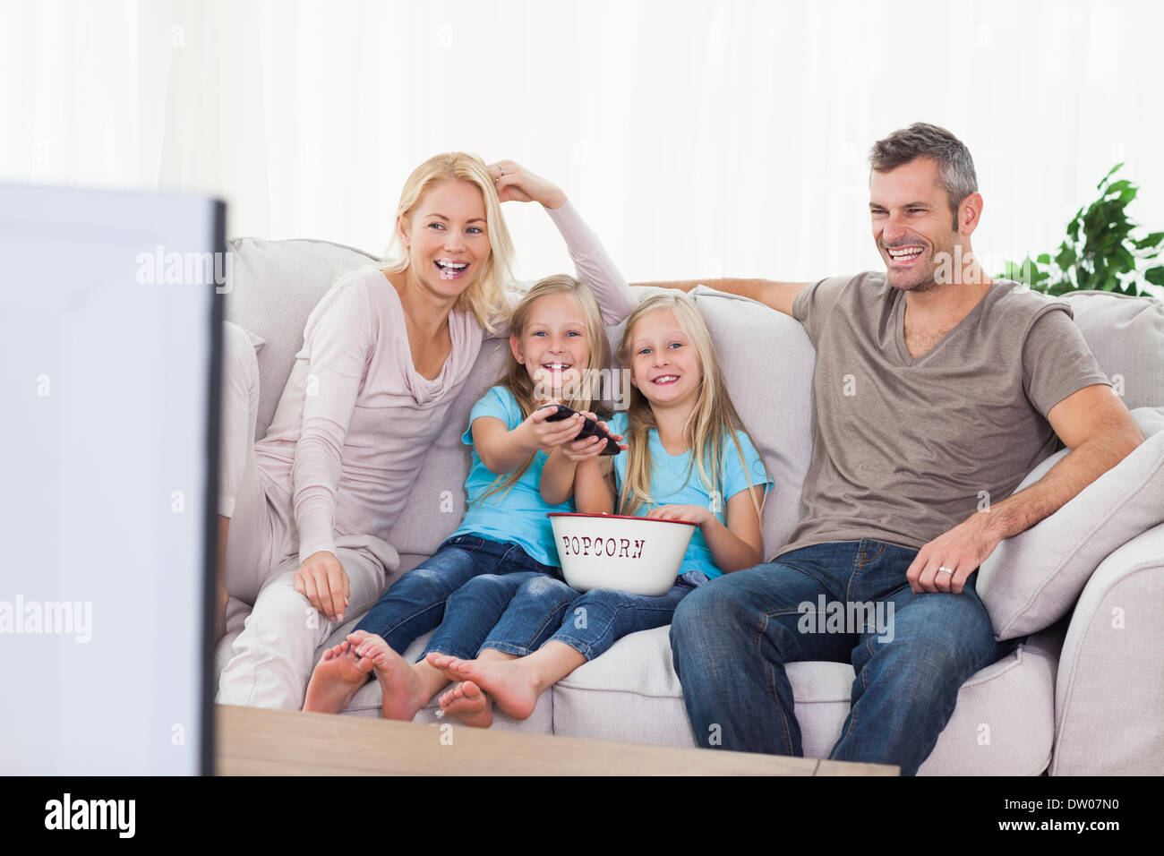 Parents watching tv hi-res stock photography and images - Alamy