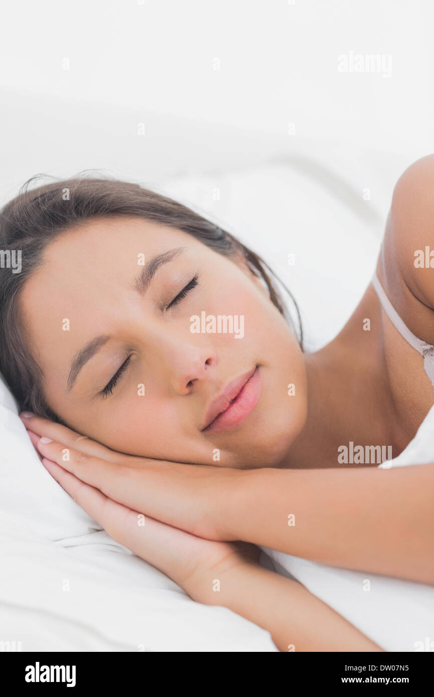 Pretty woman sleeping in bed Stock Photo - Alamy